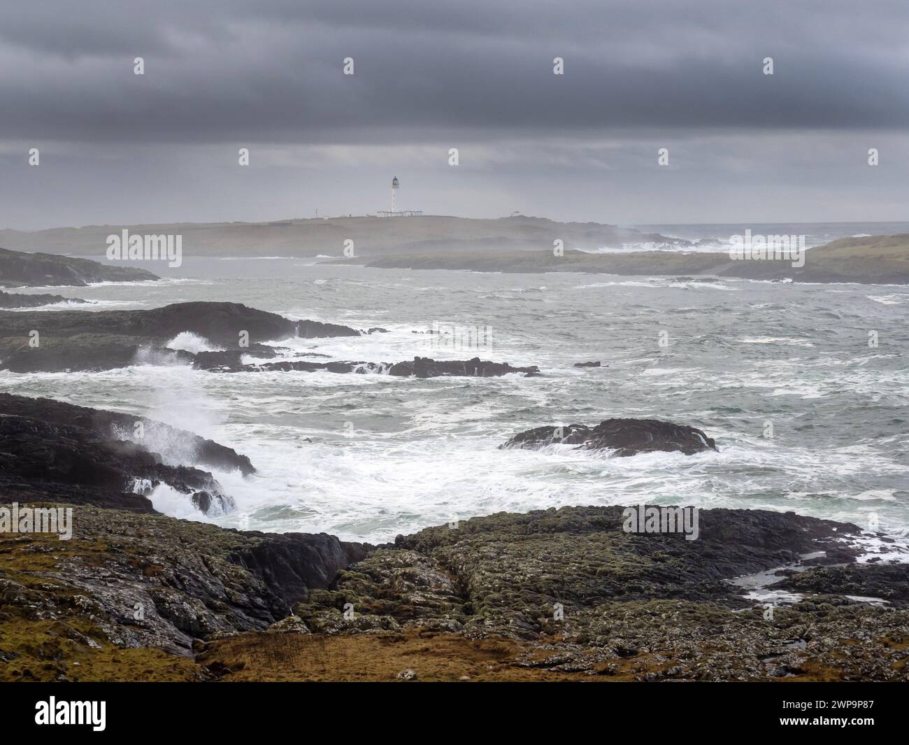 The Rhinns of Islay Lighthouse on Orsay island just off Portnahaven on ...