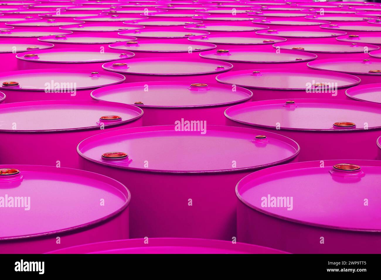 metal barrels of pink color Stock Photo - Alamy