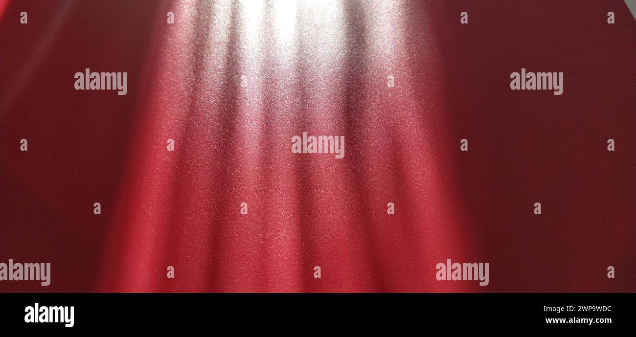 spotlights and rays from above on a red background. Rays on a red ...