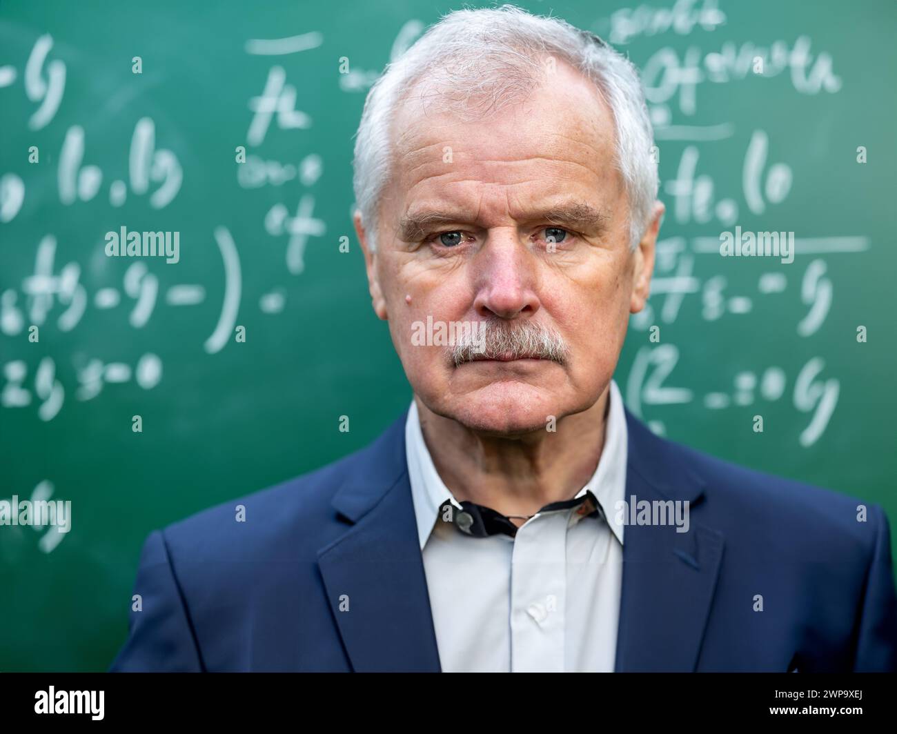 Serious teacher classroom hi-res stock photography and images - Alamy