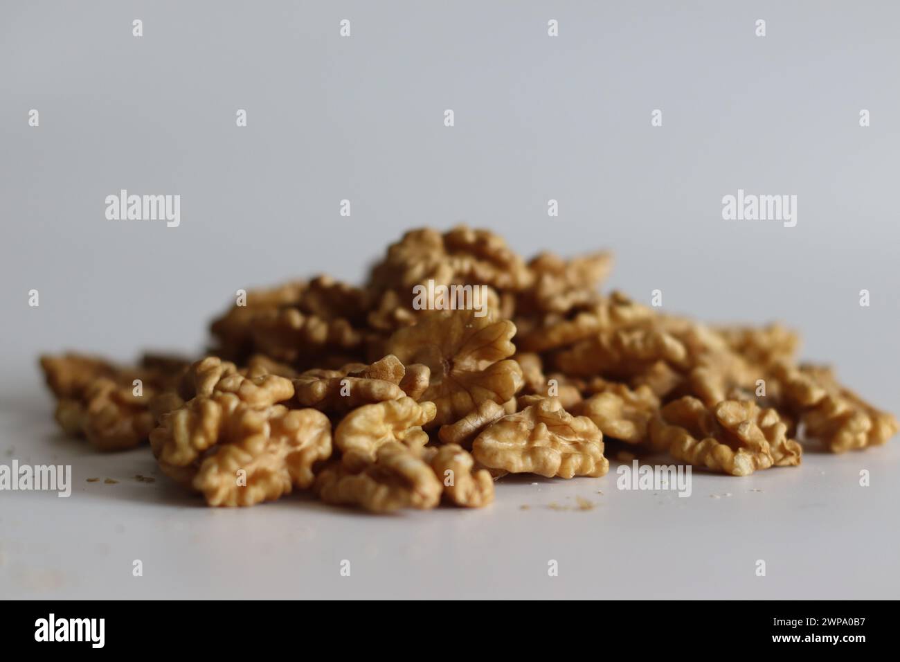 Pristine pile of premium dry walnuts, ideal for culinary creations and ...