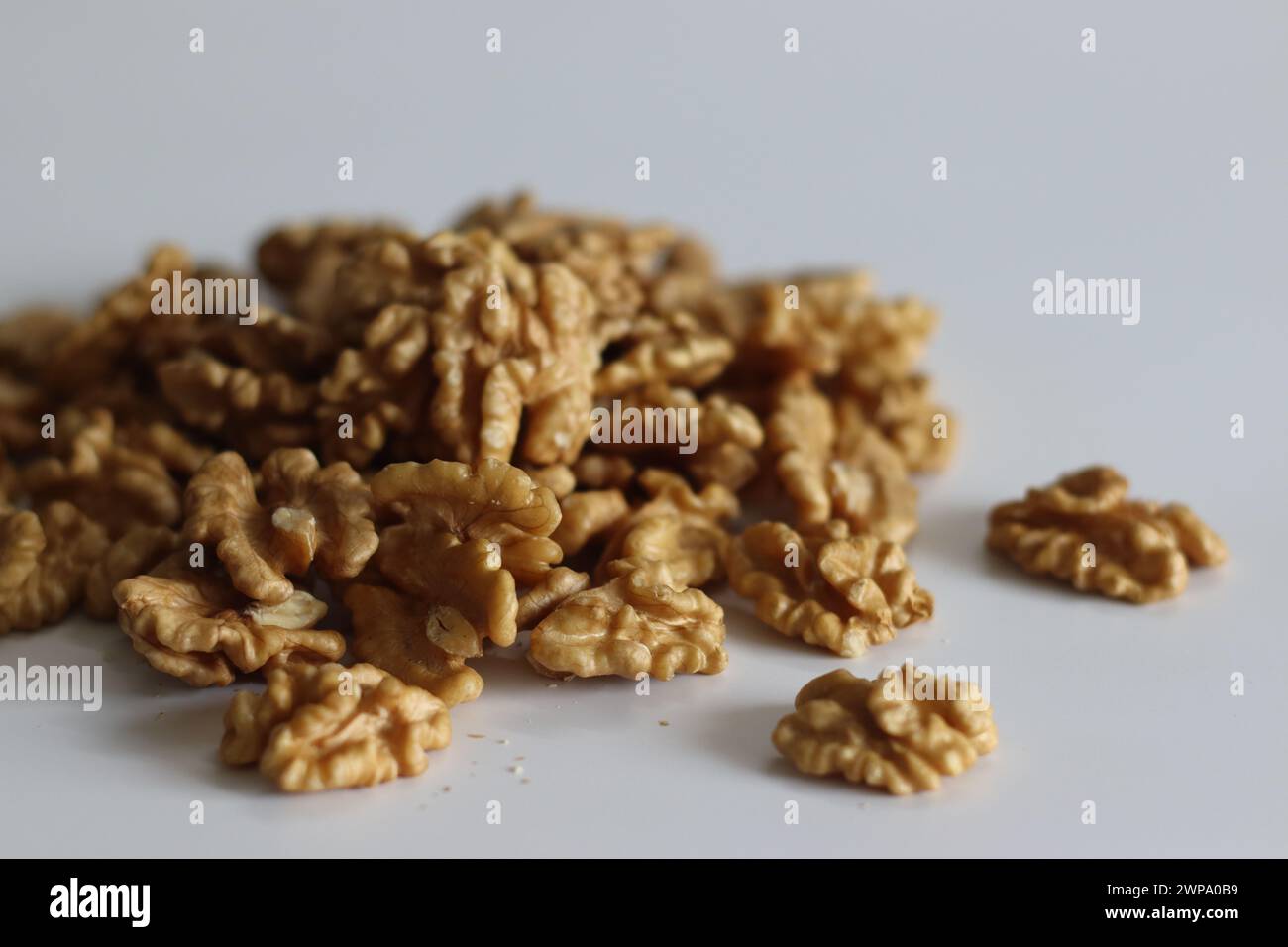 Pristine pile of premium dry walnuts, ideal for culinary creations and ...