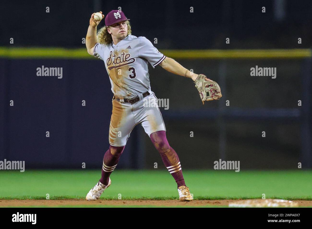 March 05, 2024: Mississippi St. infielder David Mershon (3) throws back ...