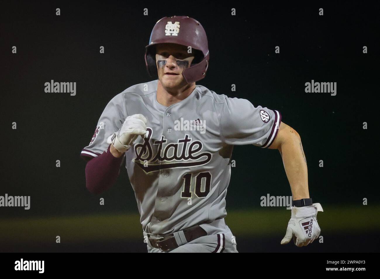 March 05, 2024: Mississippi St. infielder Dylan Cupp (10) approaches ...
