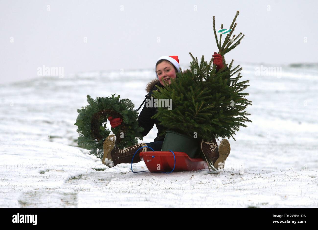 06/12/13 After over-night snowfall, Melissa Ebbatson, 20, from Green ...