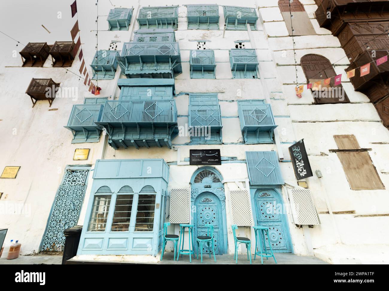 Al-Balad old town with traditional muslim houses with blue windows and ...