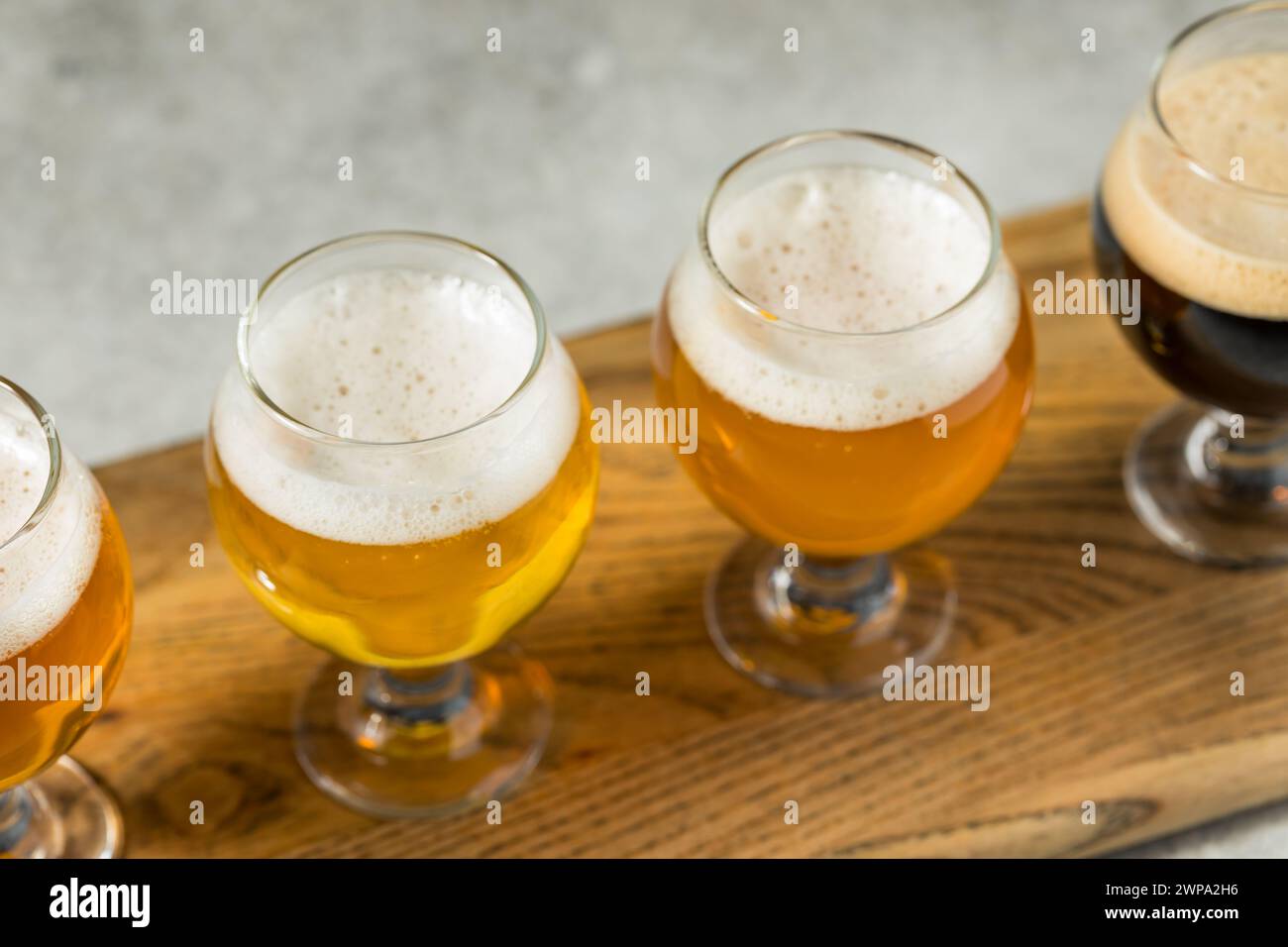 Boozy Cold Refreshing Craft Beer Flight with Peanuts Stock Photo - Alamy