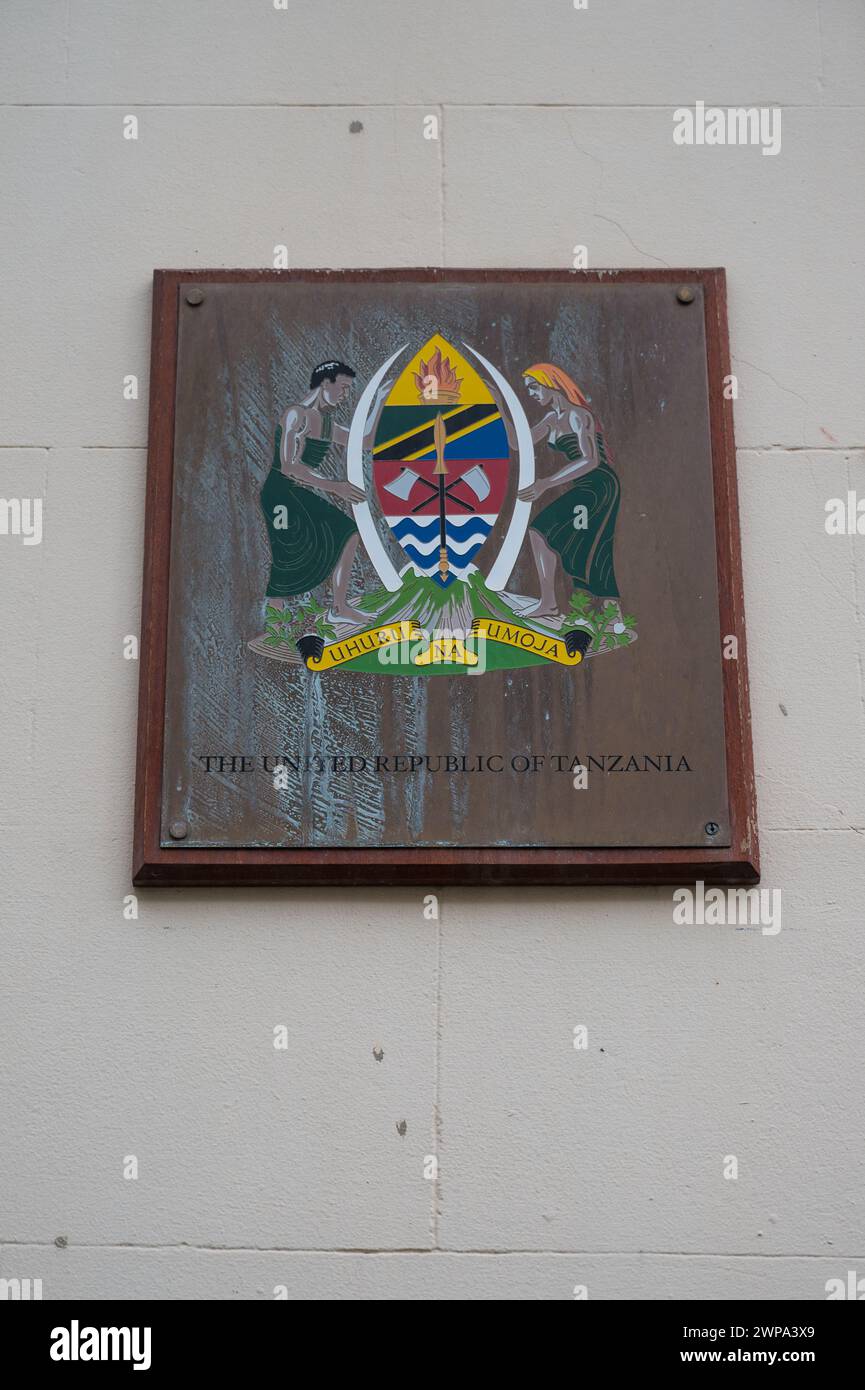 Plaque bearing the national coat of arms of United Republic of Tanzania ...