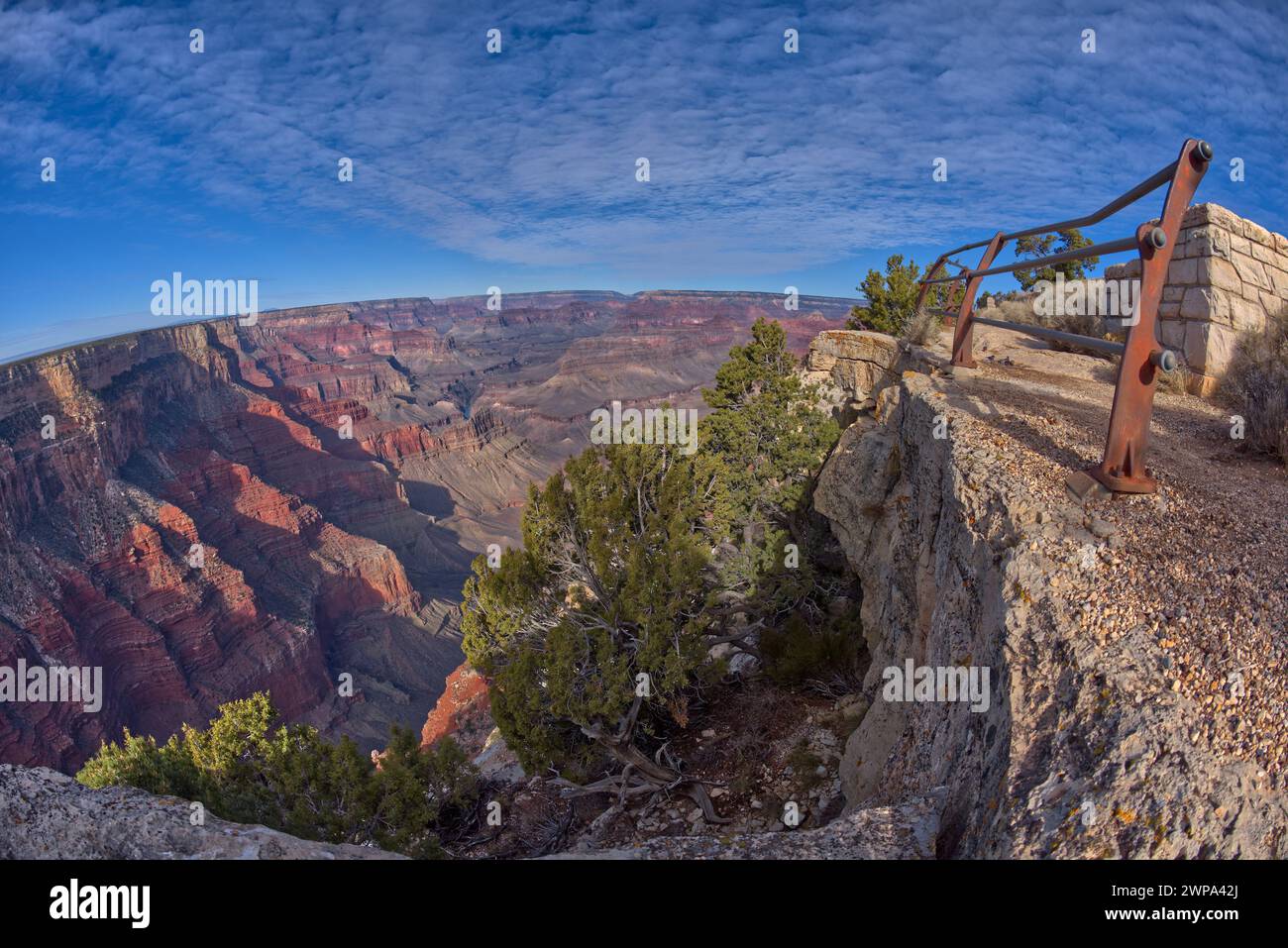 Below the safety railing of the Great Mohave Wall Overlook at Grand ...