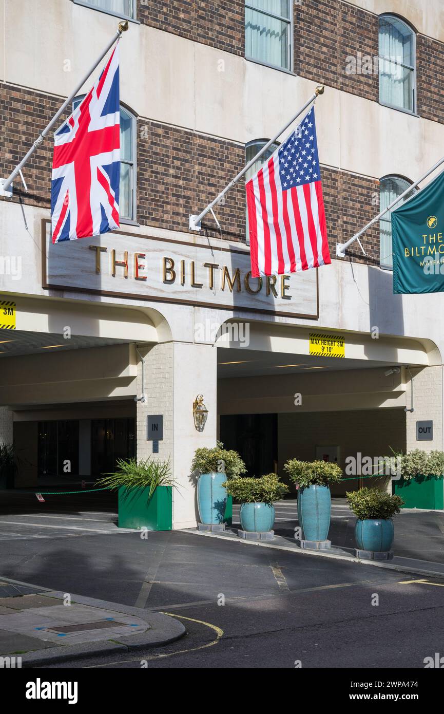 Union Jack, Stars and Stripes and corporate flag above car park ...