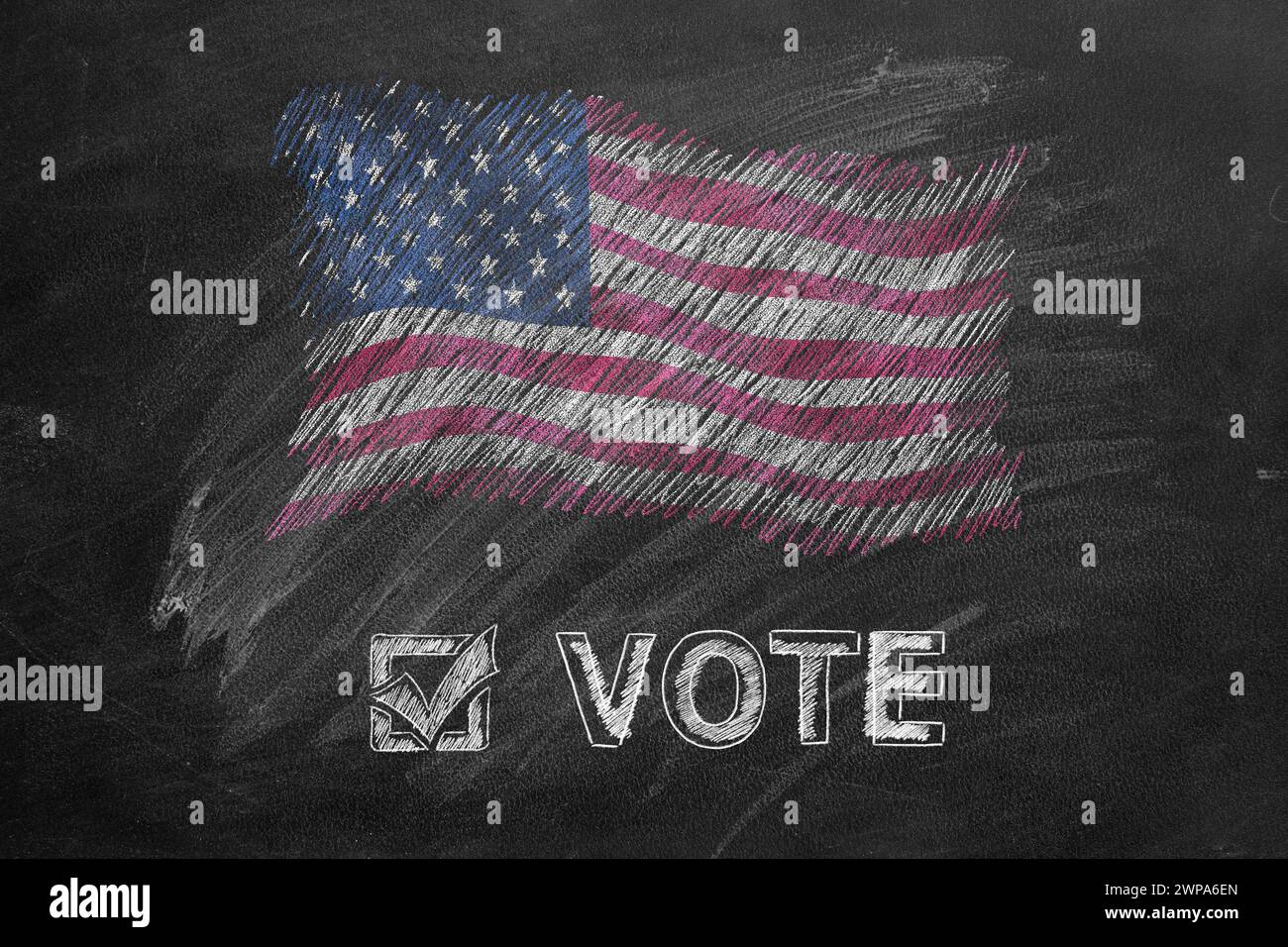 Handwritten word VOTE with American flag on chalkboard. Vote in ...