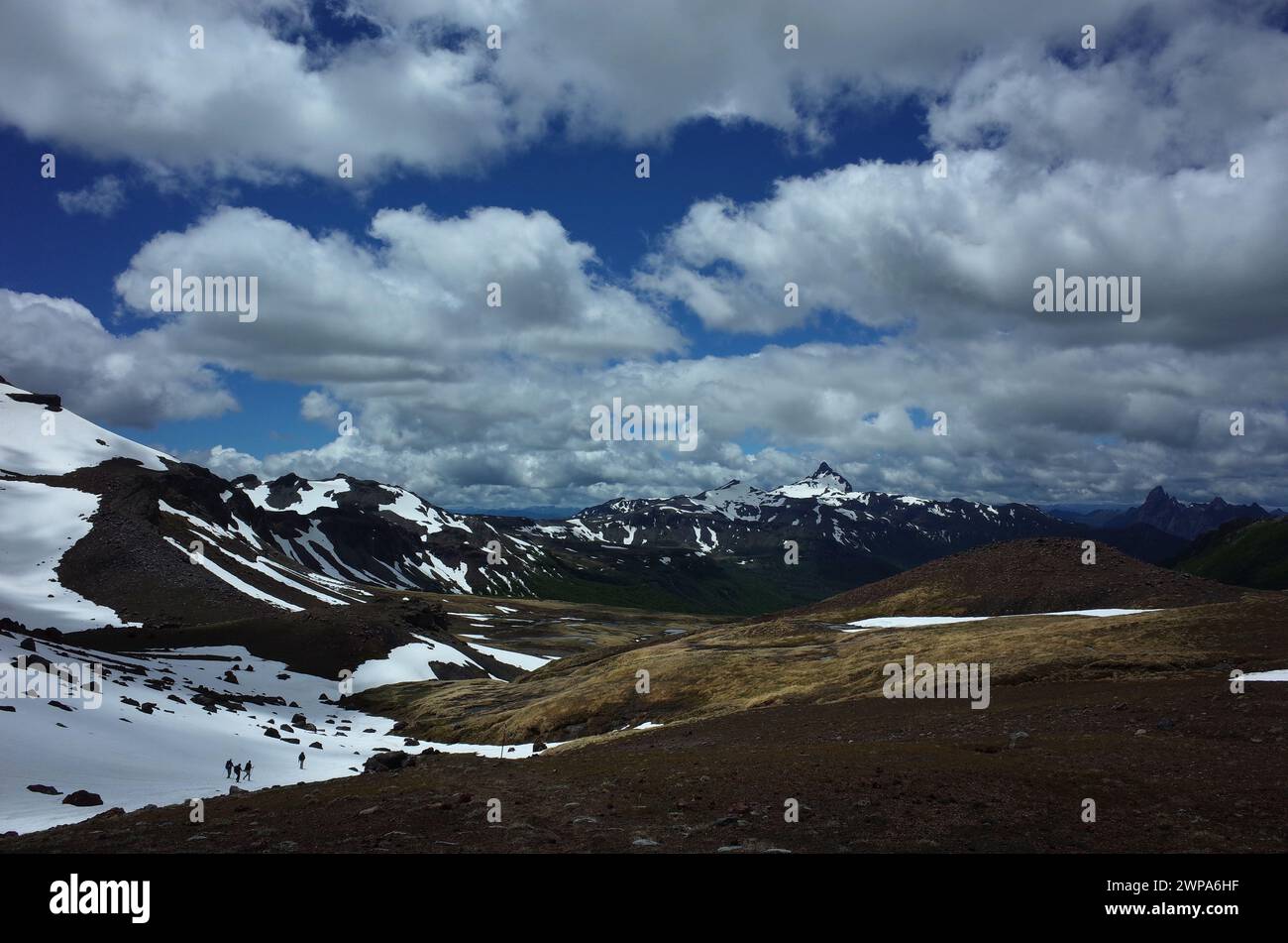 Mountain landscape Andes in Patagonia, Hikers walking on snow ...