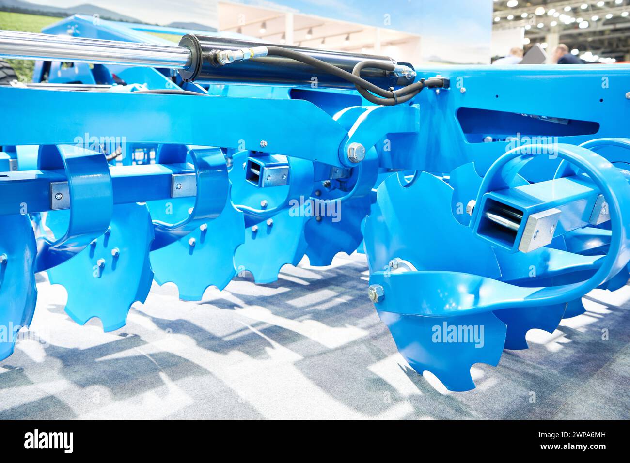 Trailed in-line disc harrow at an agricultural exhibition Stock Photo ...