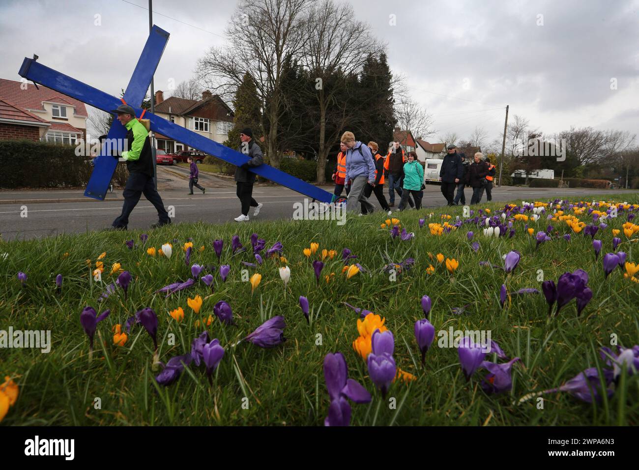08/03/14 To mark Lent worshippers drag an 18 ft cross over 18 miles ...