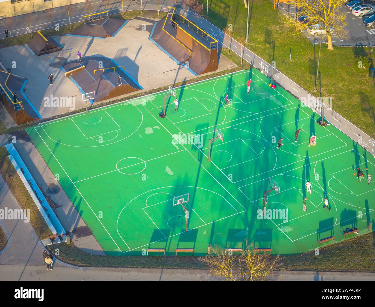 Public basketball court and skate park. Tops down aerial view photo ...