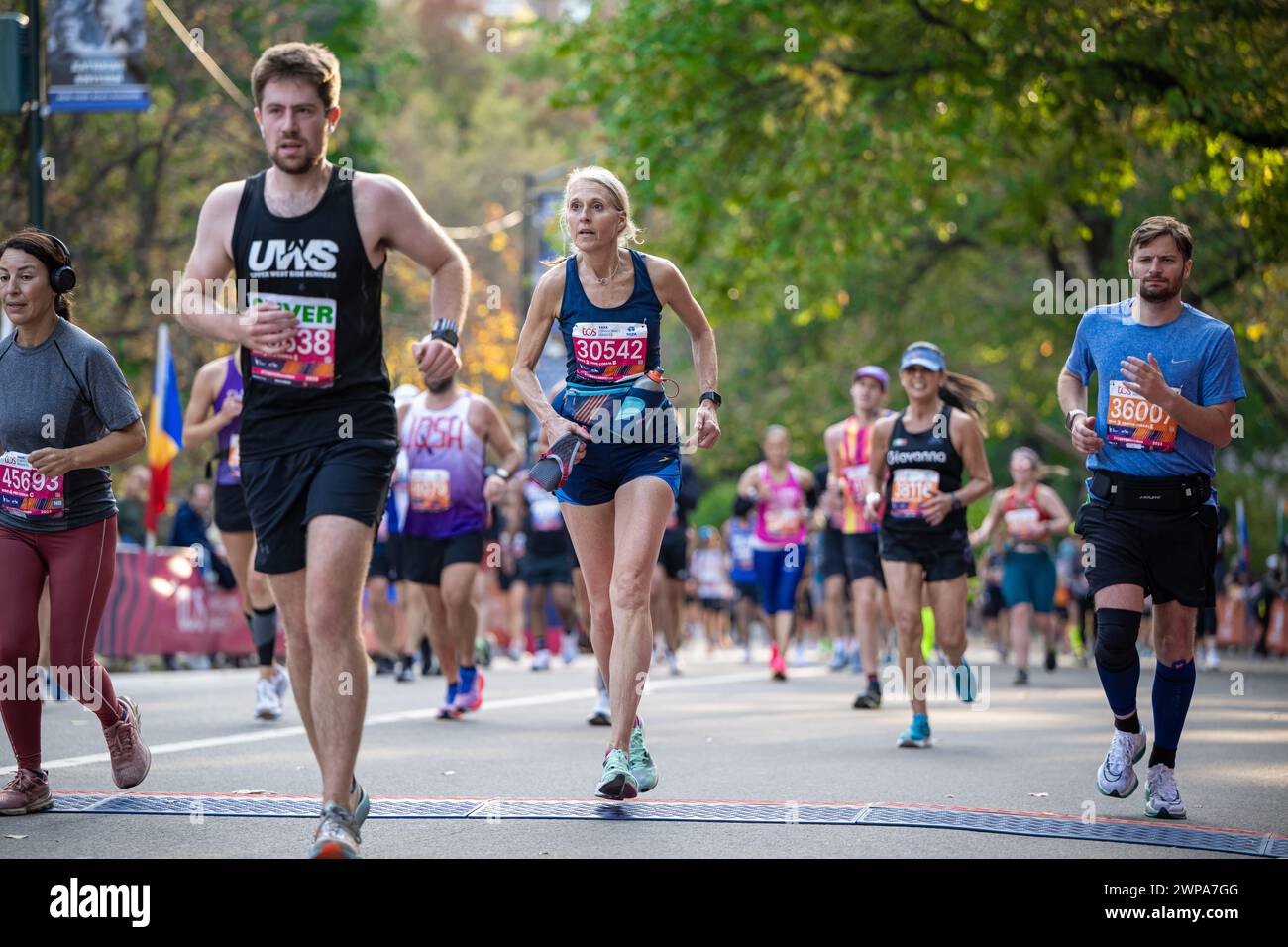 Runners in Central Park participating in the 2023 New York Marathon ...