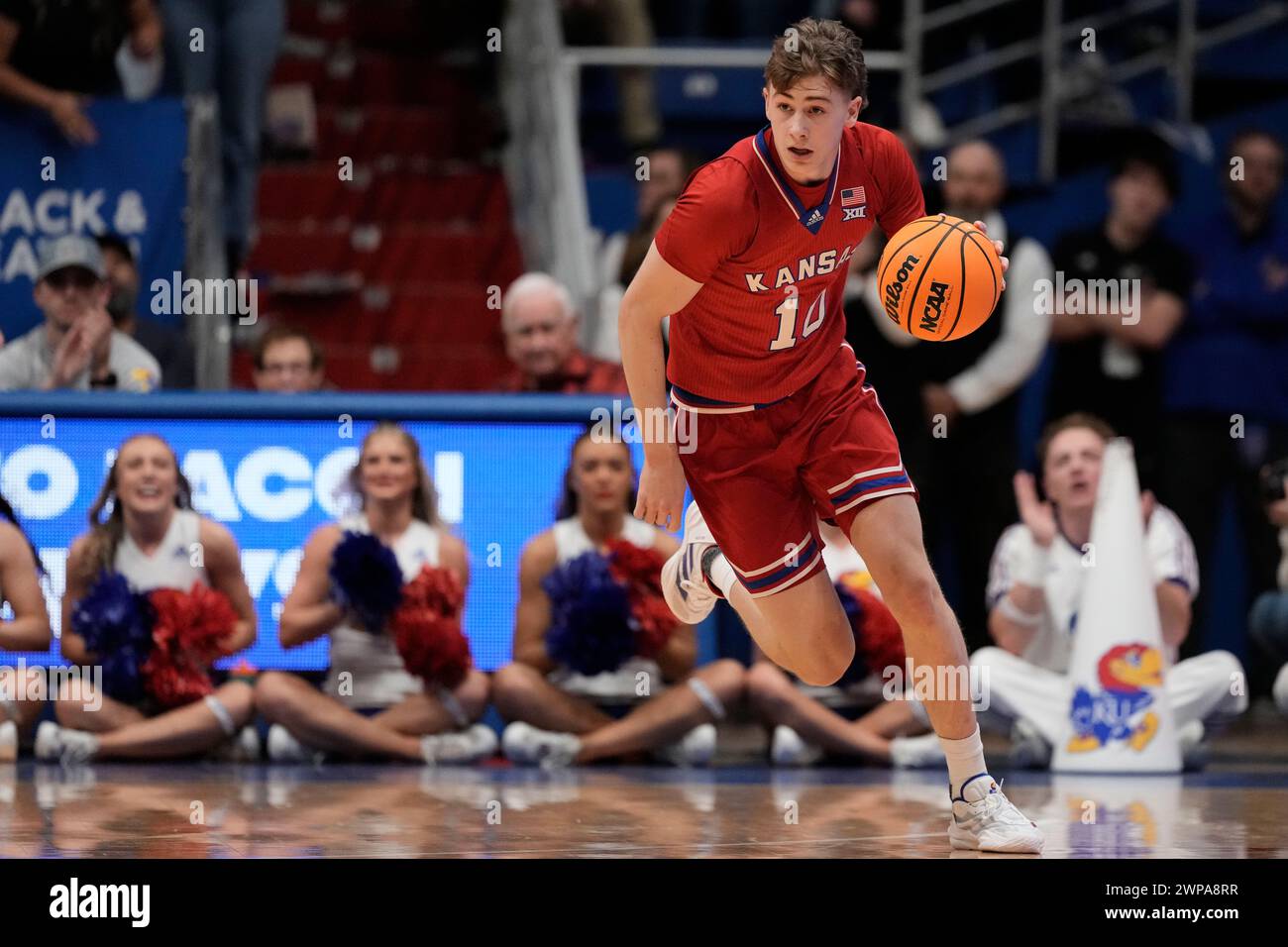 Kansas guard Johnny Furphy drives during the first half of an NCAA ...