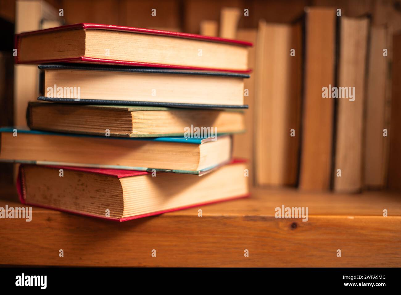 copy space old textbooks stacked in the university library Stock Photo ...
