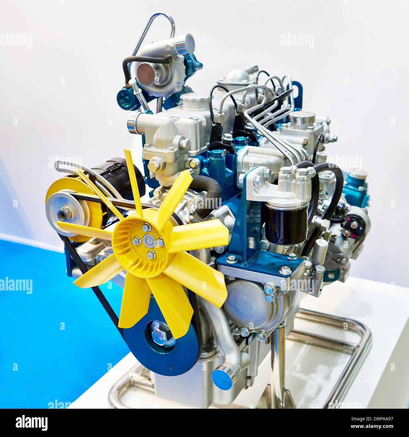 Diesel four cylinder engine for tractor at exhibition Stock Photo - Alamy