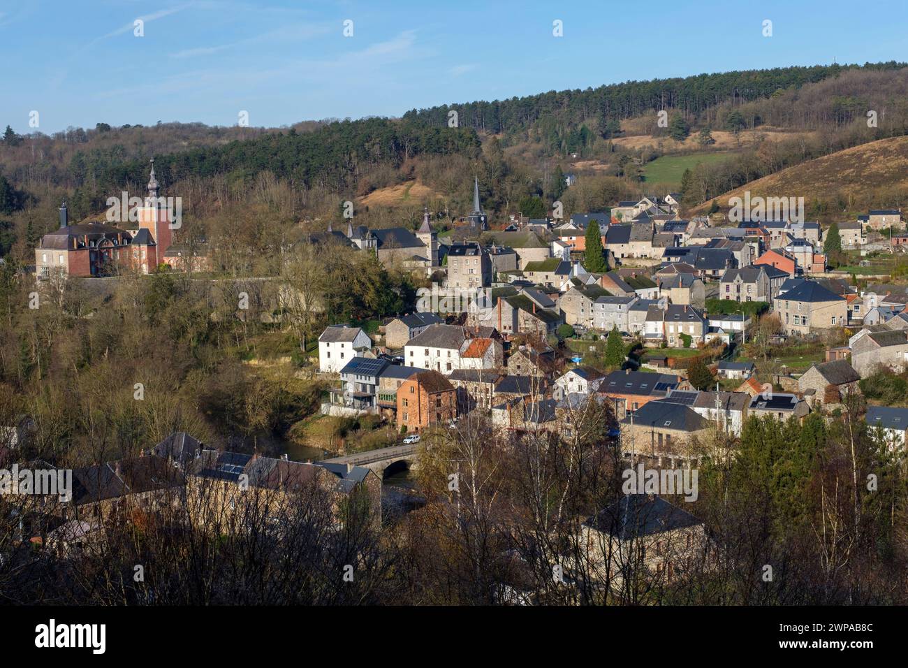 Located in the valley of the river Viroin, the village stands along the ...