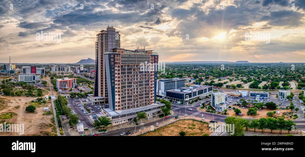 aerial view CBD , Gaborone, Botswana, intersection and cars, at sunset ...