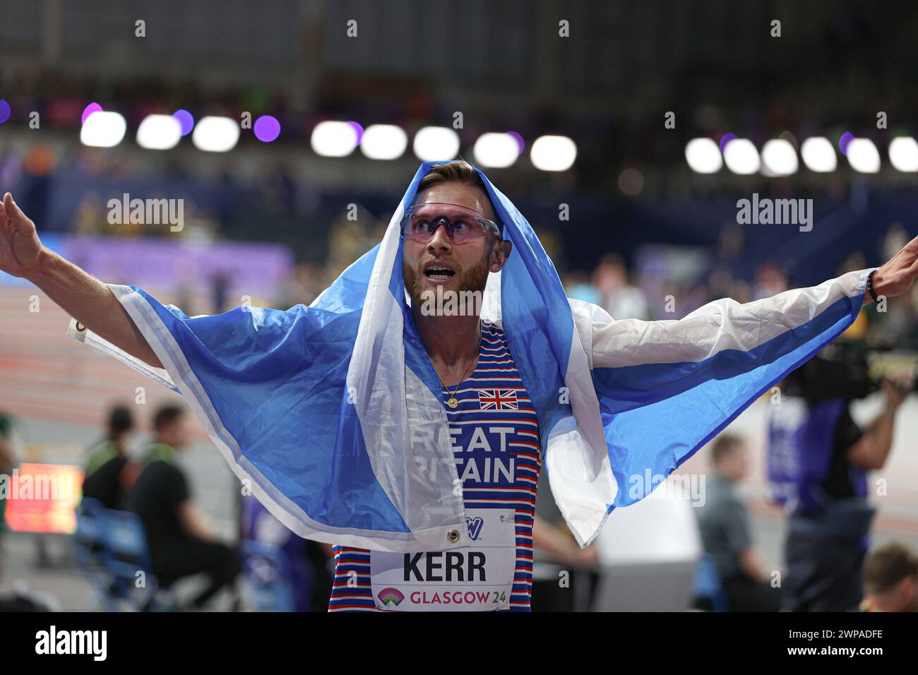 Josh Kerr with the Scottish Flag after winning Scotlands first indoor ...