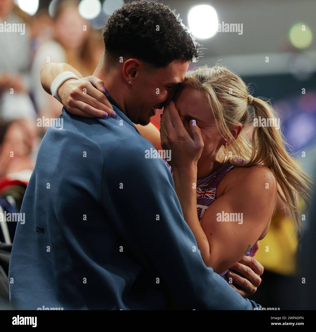 Molly Caudery with her boyfriend celebrating During the World Athletics ...