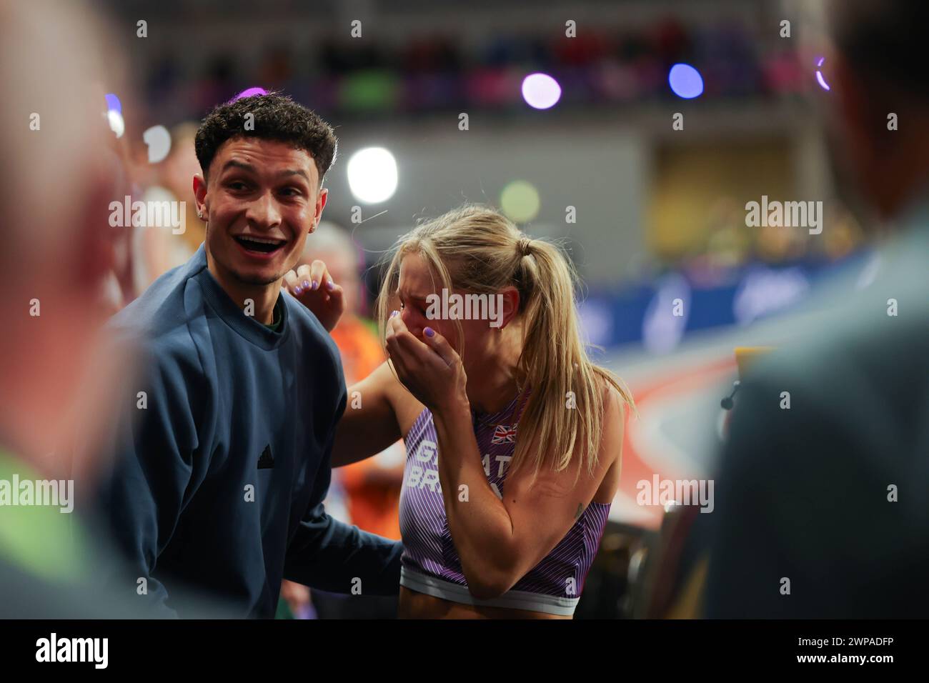 Molly Caudery with her boyfriend celebrating During the World Athletics ...