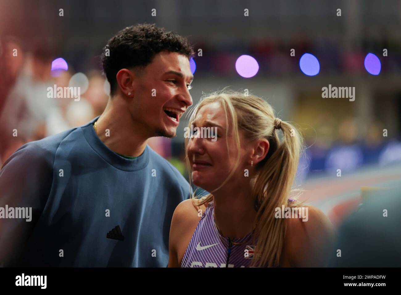 Molly Caudery with her boyfriend celebrating During the World Athletics ...