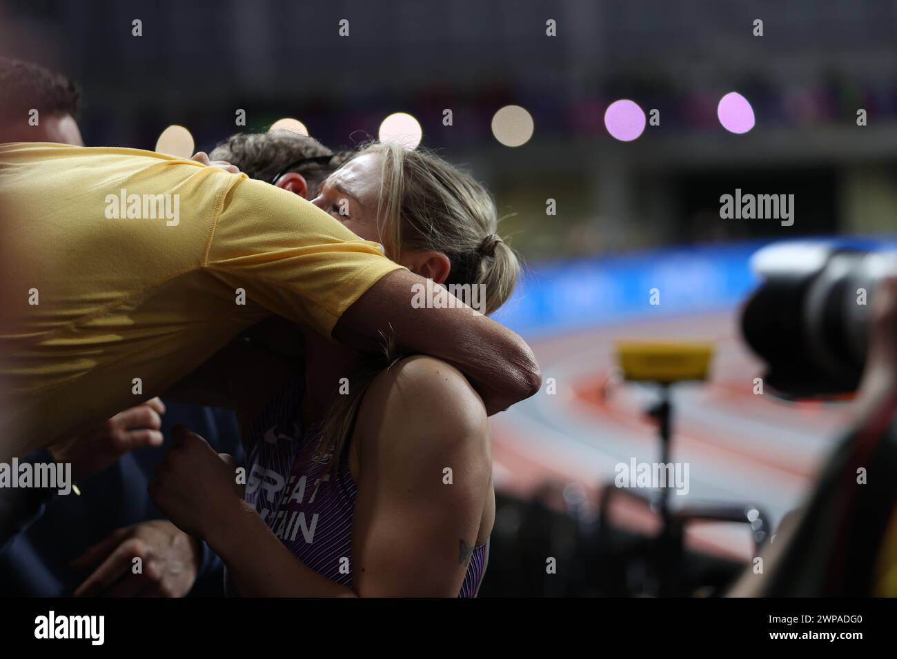 Molly Caudery and a supporter celebrating During the World Athletics ...