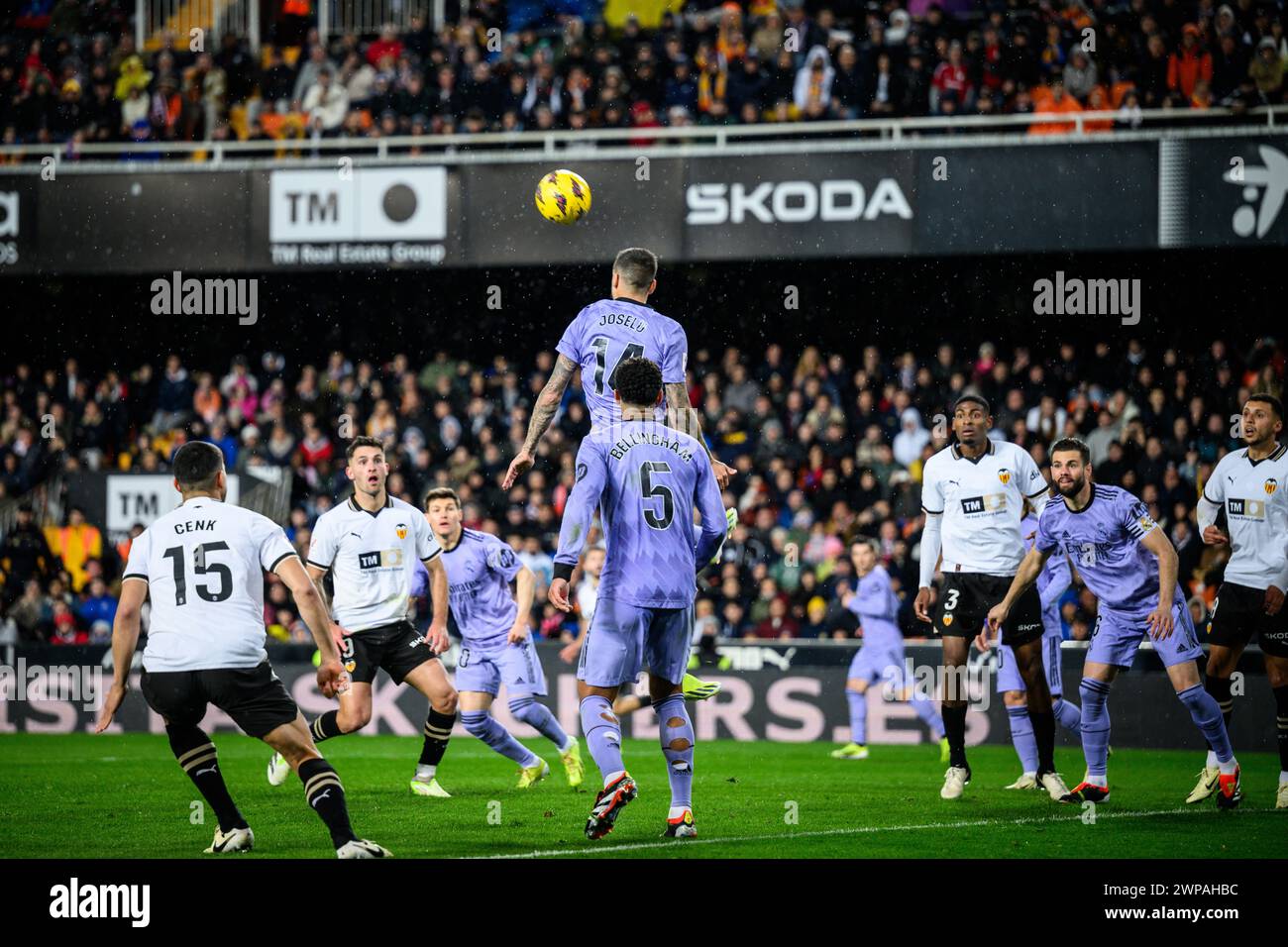 Real Madrid striker Joselu jumping inside the area to finish off a ball ...