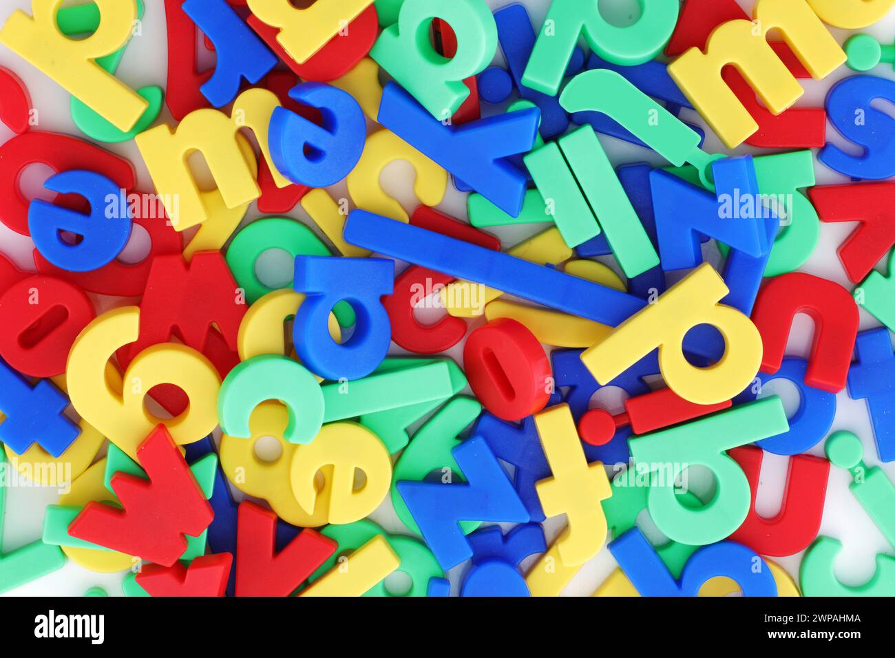 coloured alphabet magnetic letters background Stock Photo - Alamy