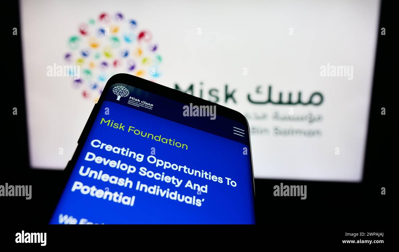 Mobile phone with website of Saudi Arabian organisation MiSK Foundation ...
