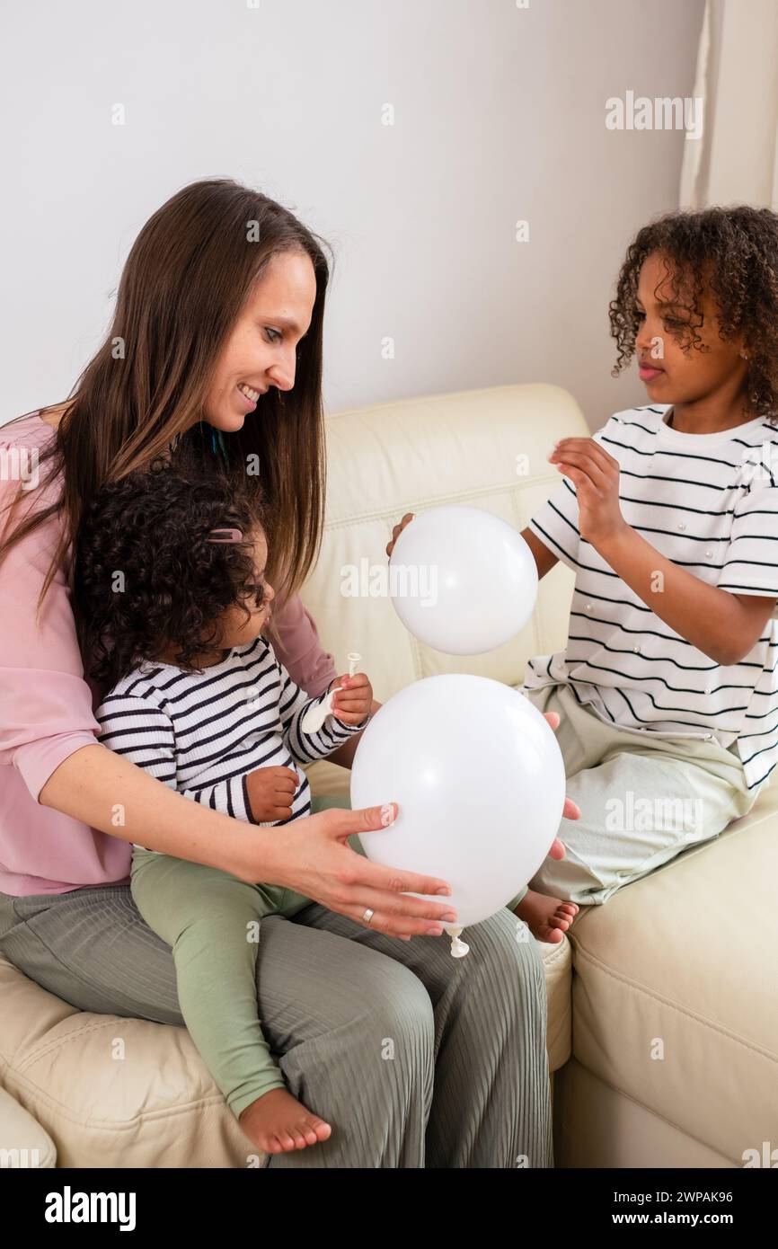 Family bonding mother shares hi-res stock photography and images - Alamy