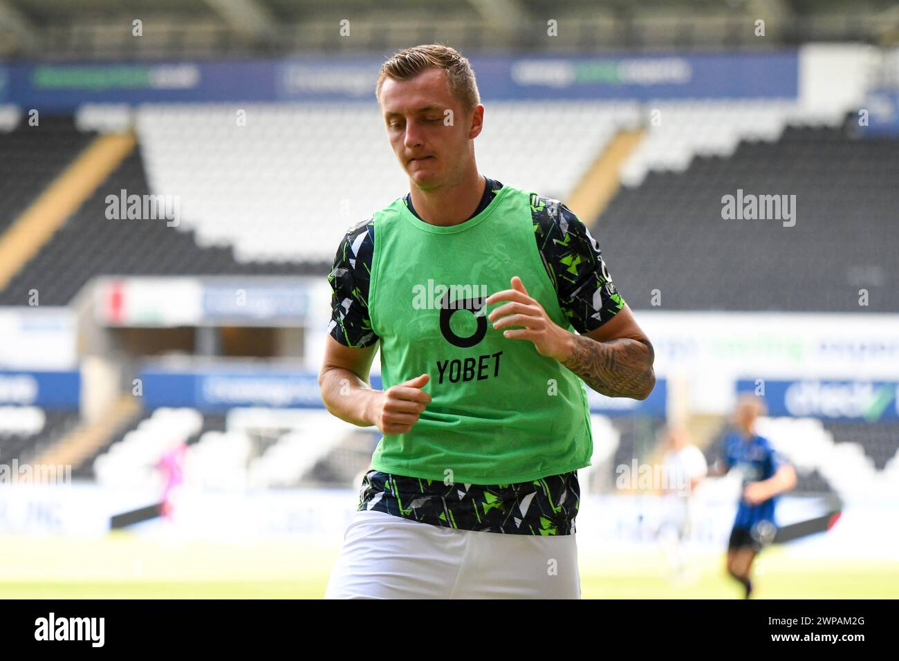 Swansea, Wales. 27 July 2019. Ben Wilmot of Swansea City warming up ...