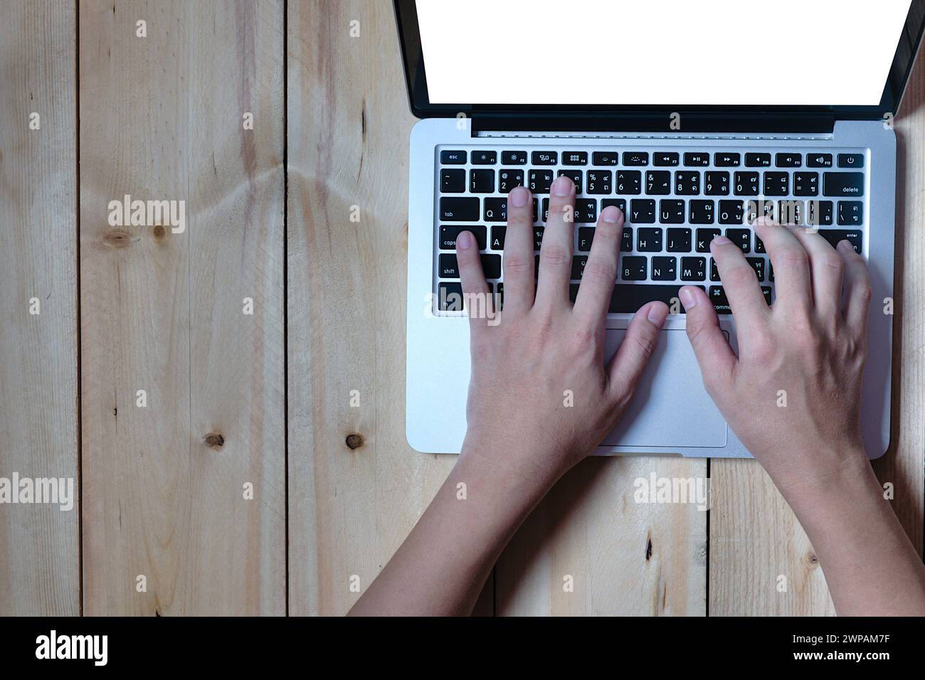 Close-up hands man who typing keyboard on computer laptop portable, top ...
