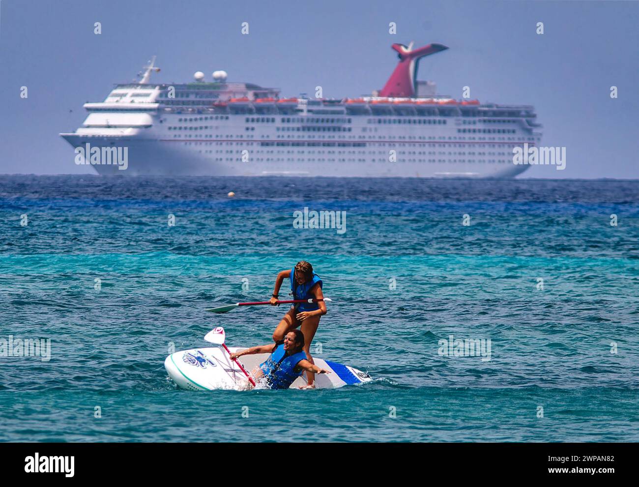 Falling off the boat in the Caribbean Stock Photo - Alamy