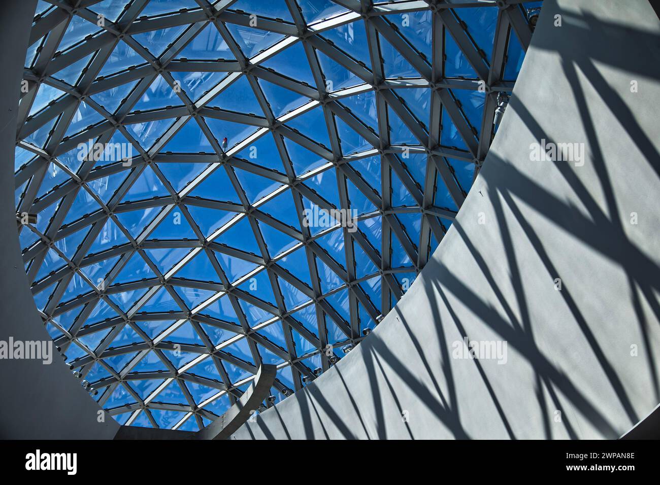 Twisted and bensing girders over a building Stock Photo - Alamy
