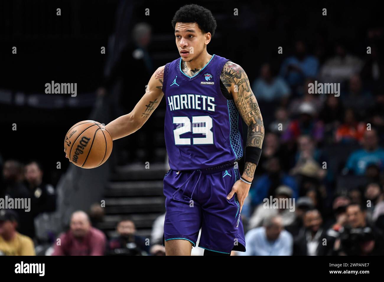 Charlotte Hornets guard Tre Mann (23) brings the ball up court during ...