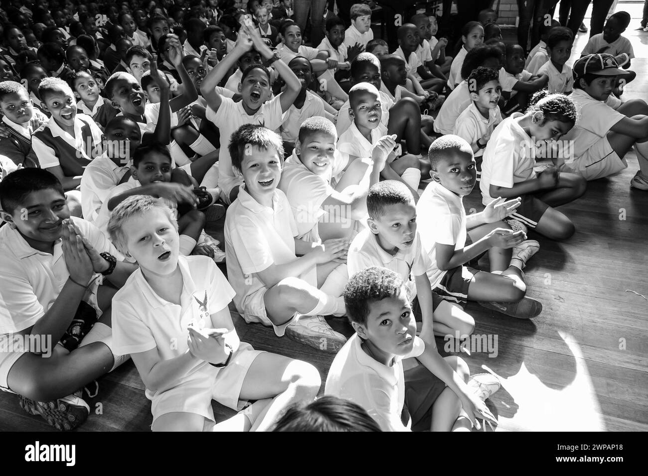 A stack of children in matching uniforms Stock Photo - Alamy