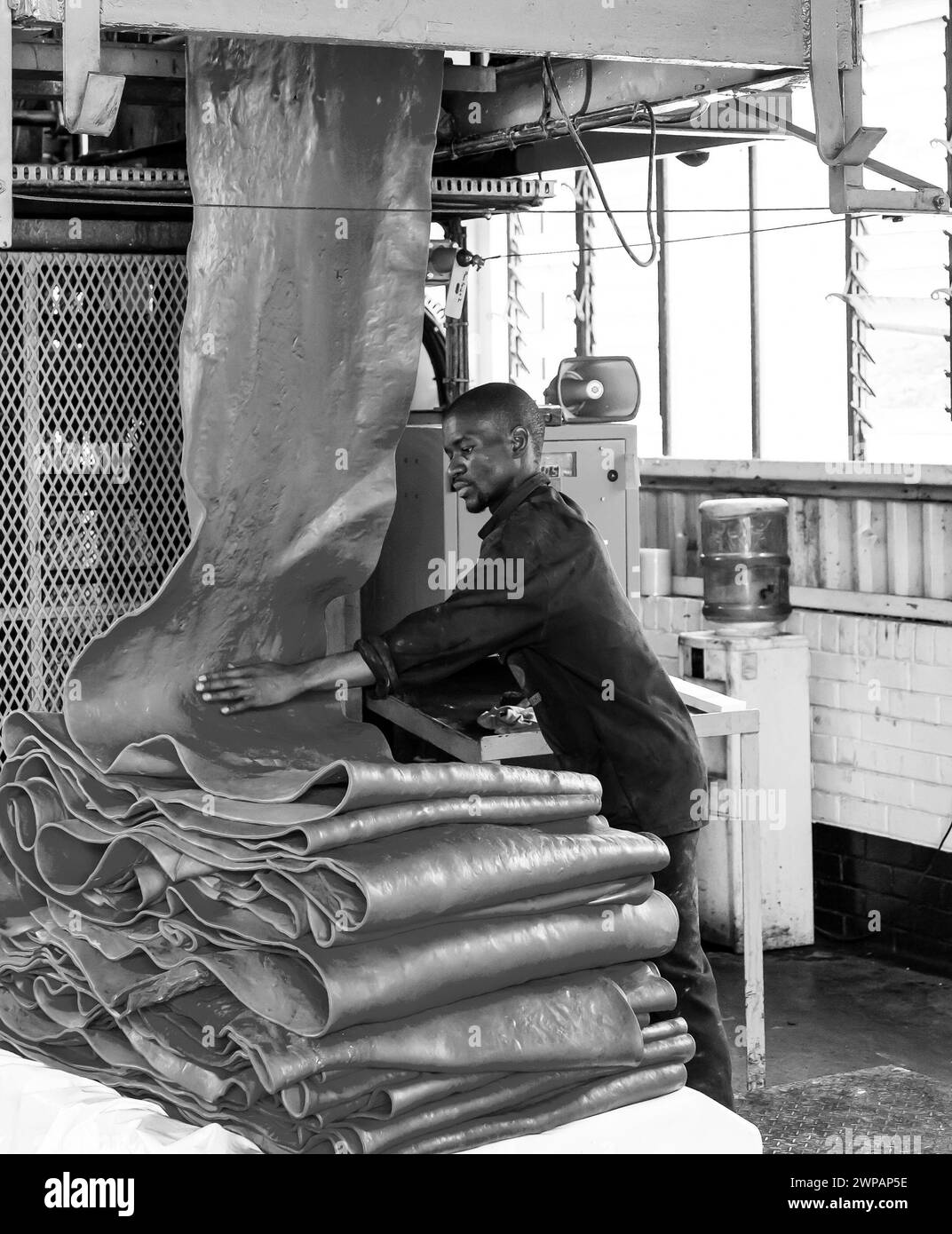 Sculptor creating a statue in a studio, examining his work Stock Photo ...