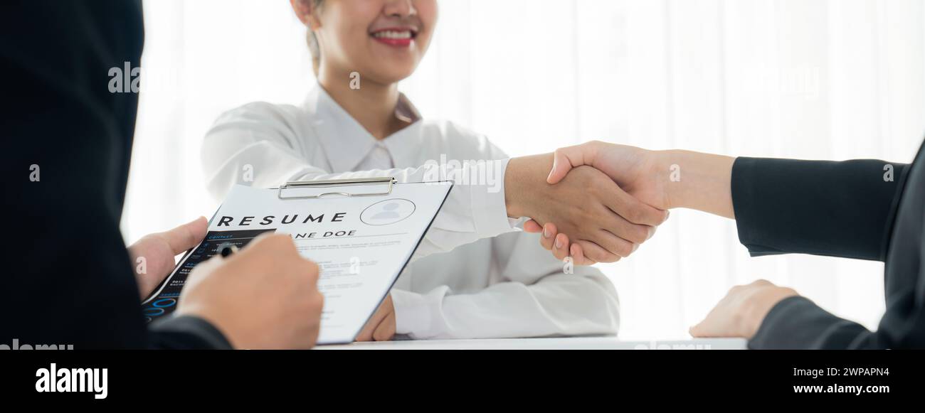 Corporate recruiter interview shake hand and hire job candidate after ...