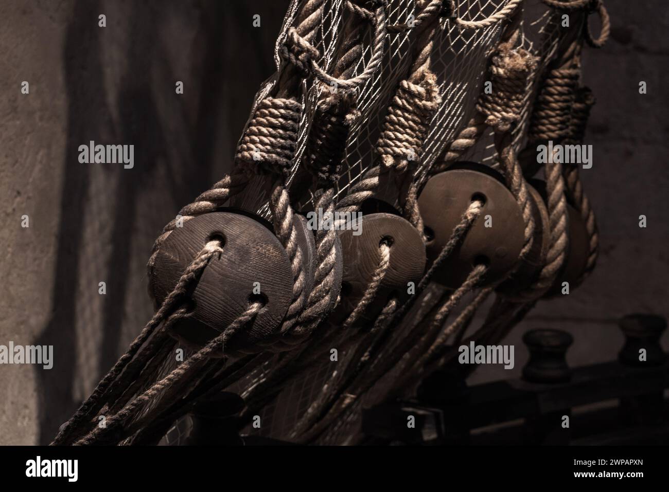 Rigging of an old sailing ship, old ropes in the dark Stock Photo - Alamy