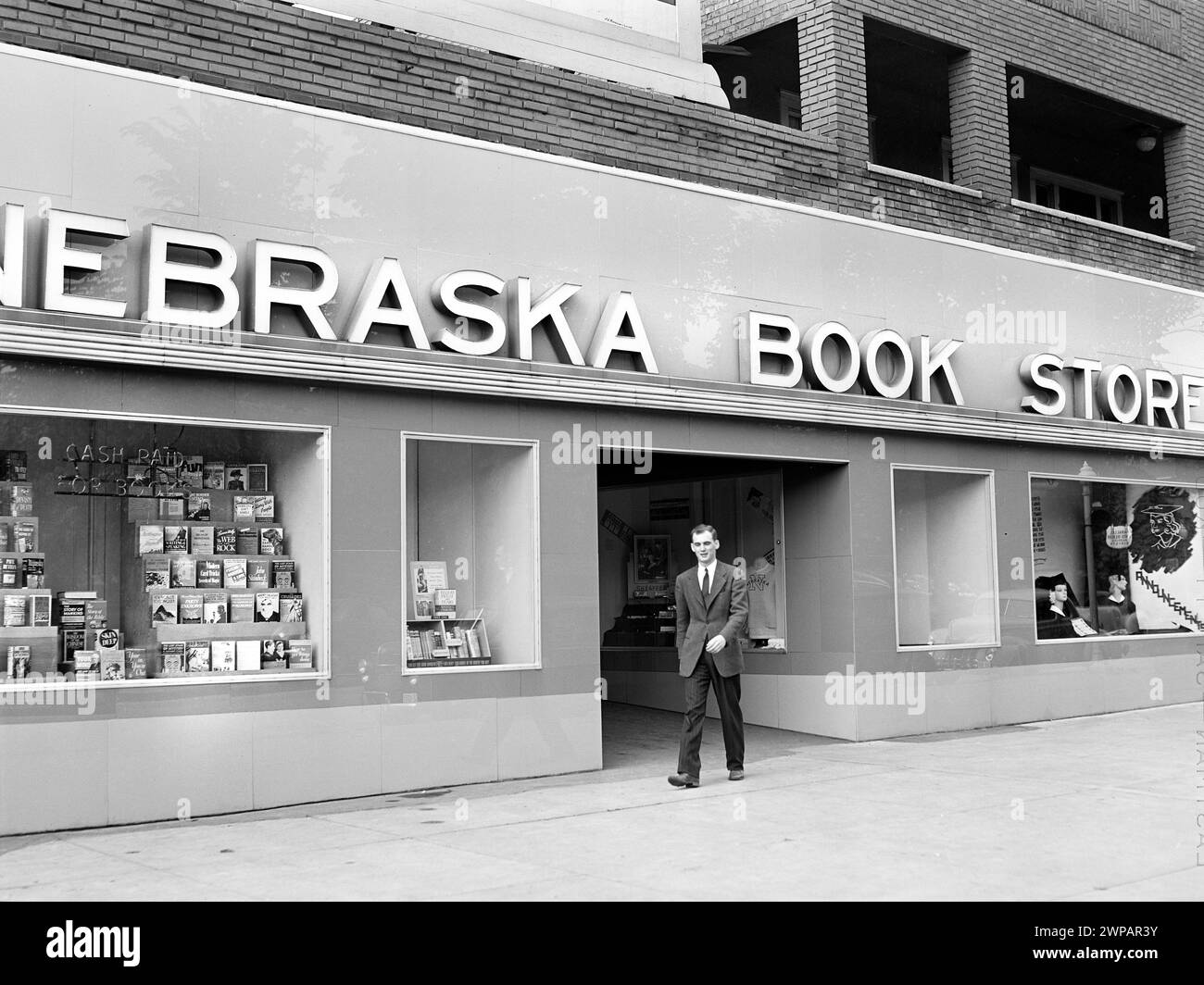John Cockle walking out of campus bookstore, University of Nebraska ...