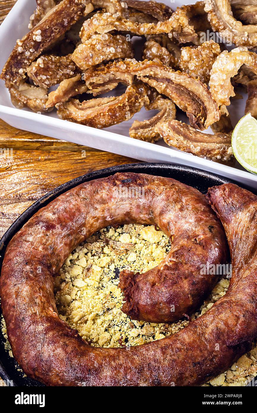 Typical food table in the interior of Brazil. Pork, beans, bean tutu ...