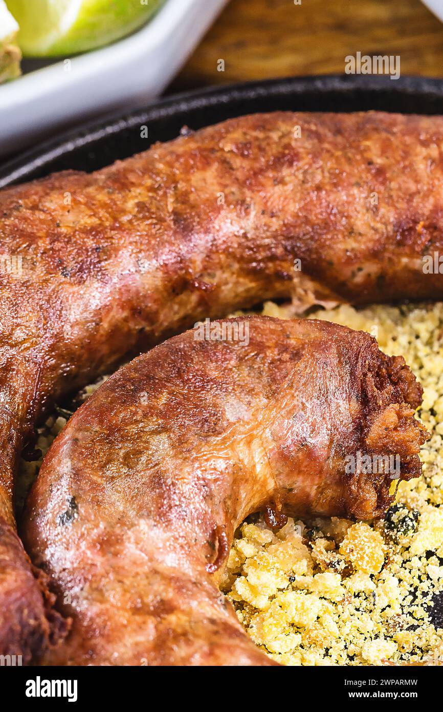 Typical food table in the interior of Brazil. Pork, beans, bean tutu ...