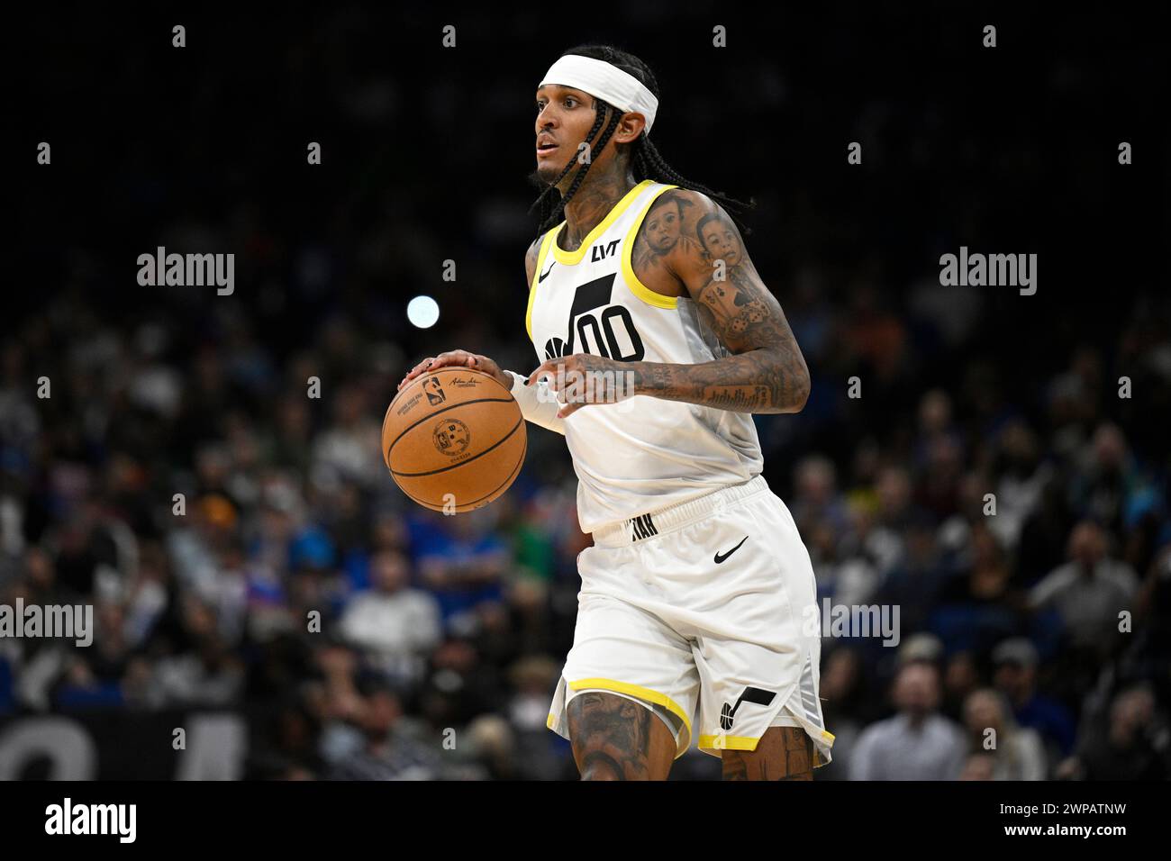 Utah Jazz guard Jordan Clarkson (00) brings the ball up the court ...