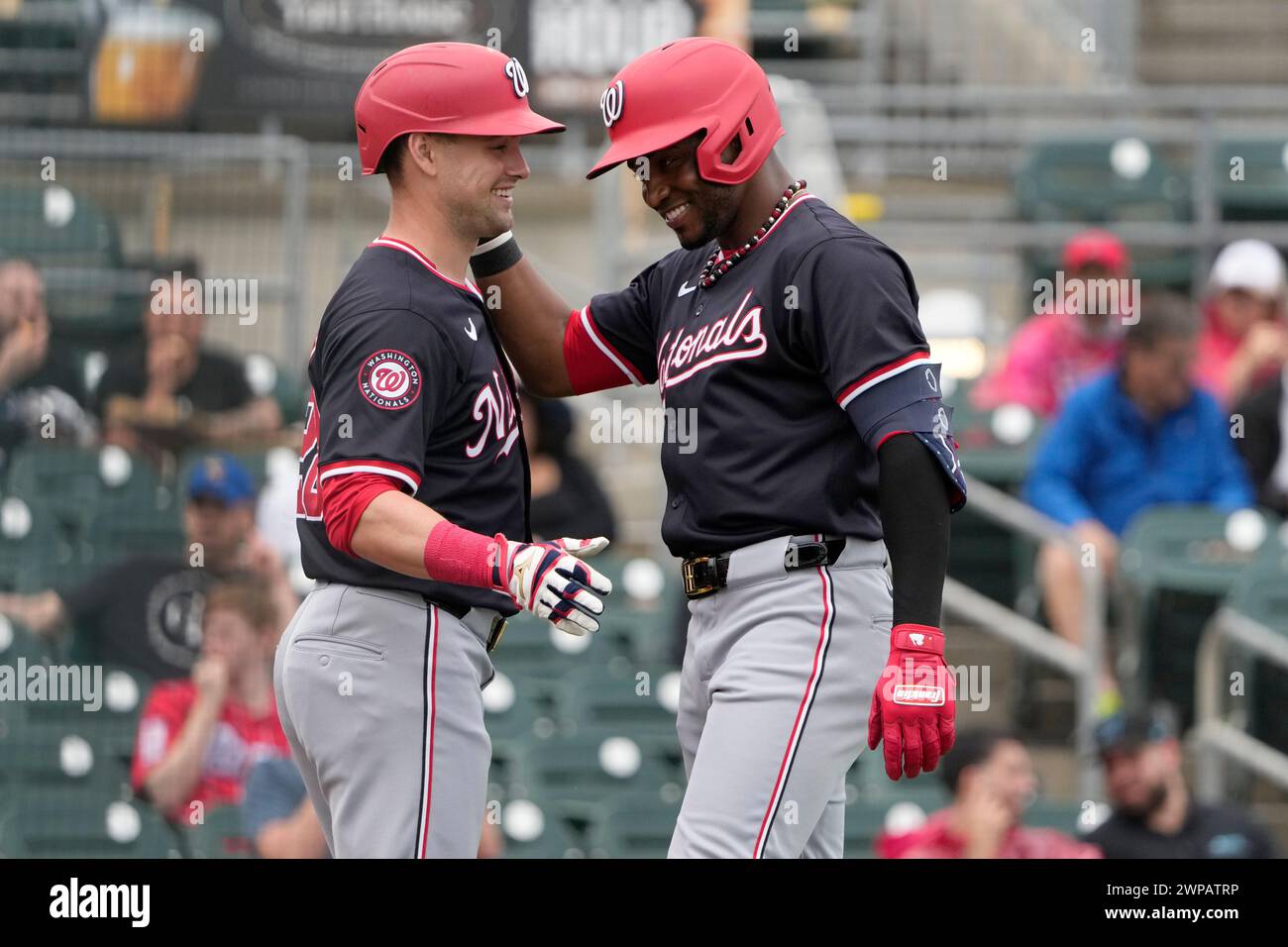 Washington Nationals' Victor Robles, right, is congratulated by ...
