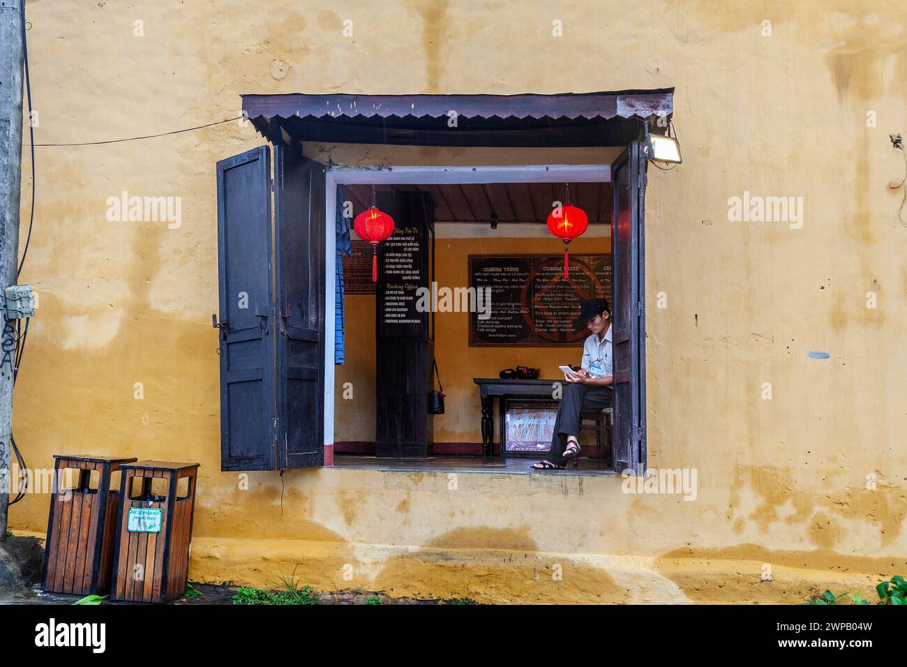 Hoi An, Vietnam; Street scene from the old town. Window into a small ...