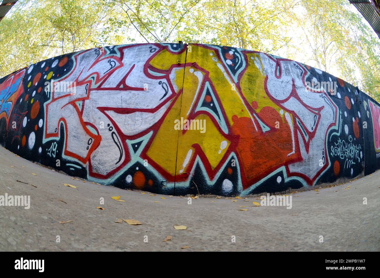 Fisheye shot of street art graffiti drawing on wall. Spray art artwork ...